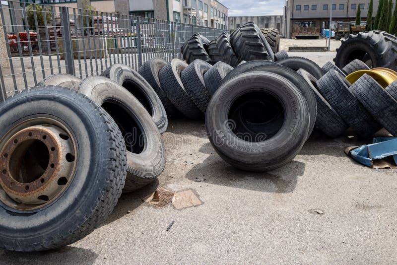 Stack of Old Used Tires of Different Sizes and Types in Abandoned Scrap ...
