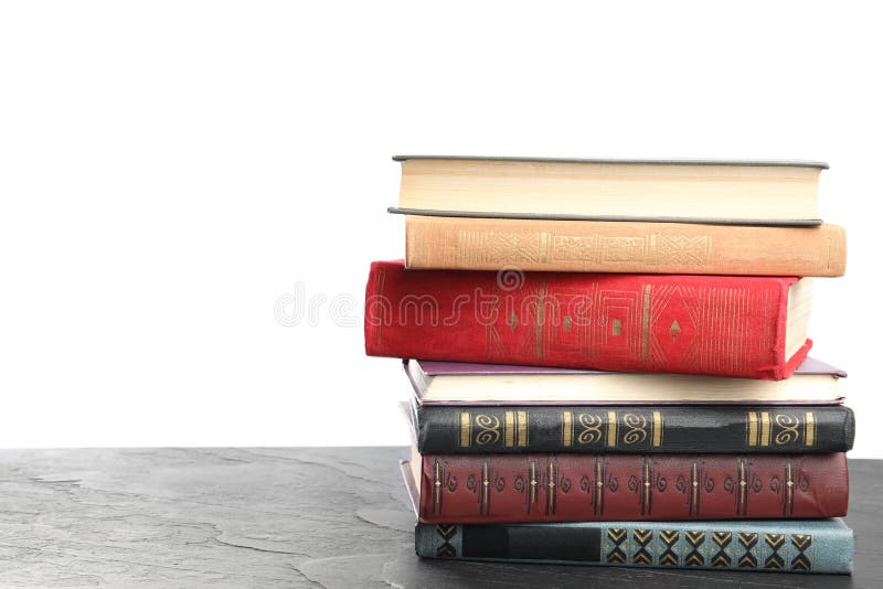Stack of Old Vintage Books on Grey Stone Table Against Background Stock ...