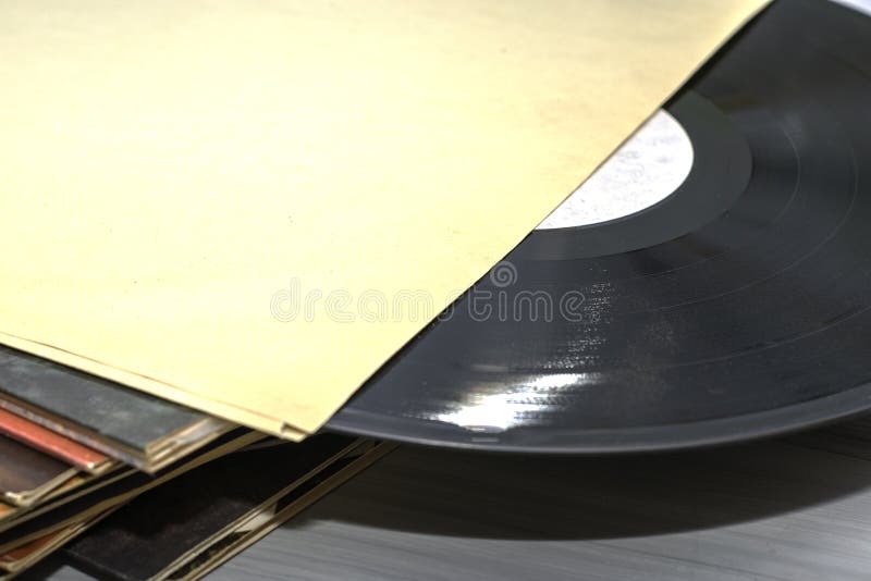 A Stack of Old Vinyl Records Close Up One of the Records is Half Out of ...