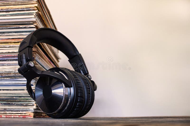Stack of Old Vinyl Records with Headphones. the Concept of Analog Sound ...