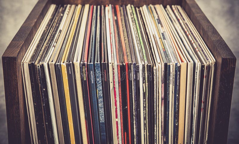 Stack of Old Vinyl Records on the Table. Retro Style Toned Image Stock ...