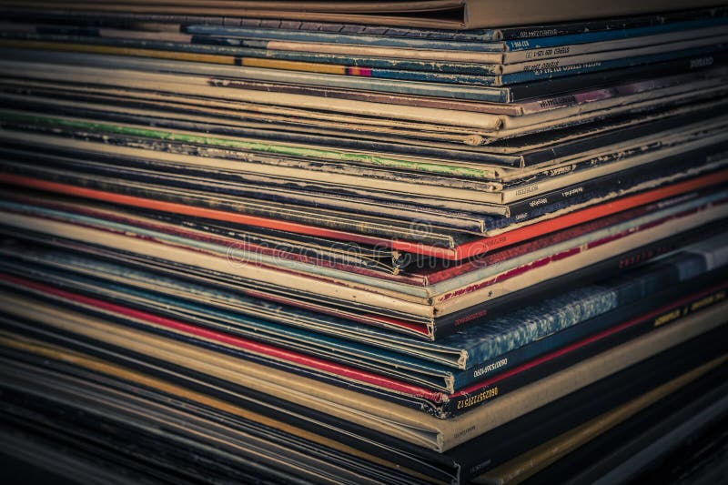 Stack of Old Vinyl Records on the Table. Retro Style Toned Image Stock ...