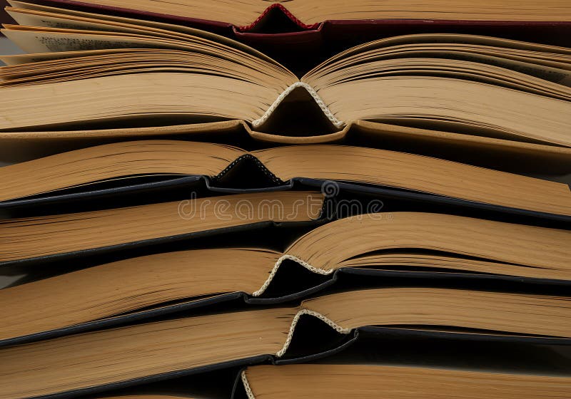 A Stack of Open Books: a Close-Up View of Aged Pages and Knowledge ...