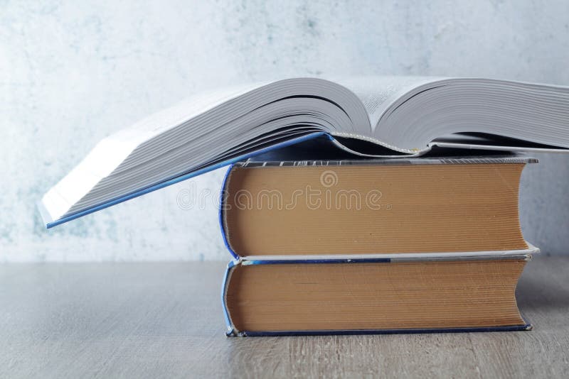 A stack of open books stock photo. Image of stacked - 146790906