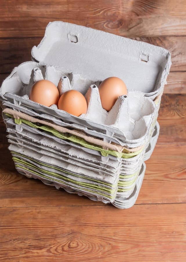 Stack of Open Pulp Egg Cartons with Several Chicken Eggs Stock Image ...