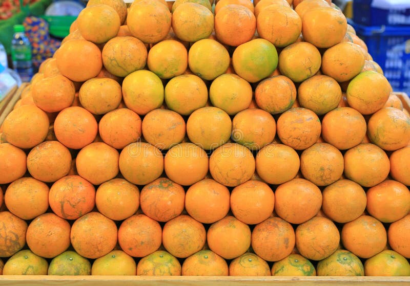 Stack of Orange Fruit at Market Stock Photo - Image of orange, passion ...