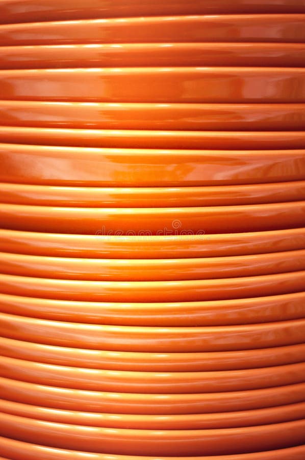Stack of Orange Plates Close-up Stock Photo - Image of ceramic ...