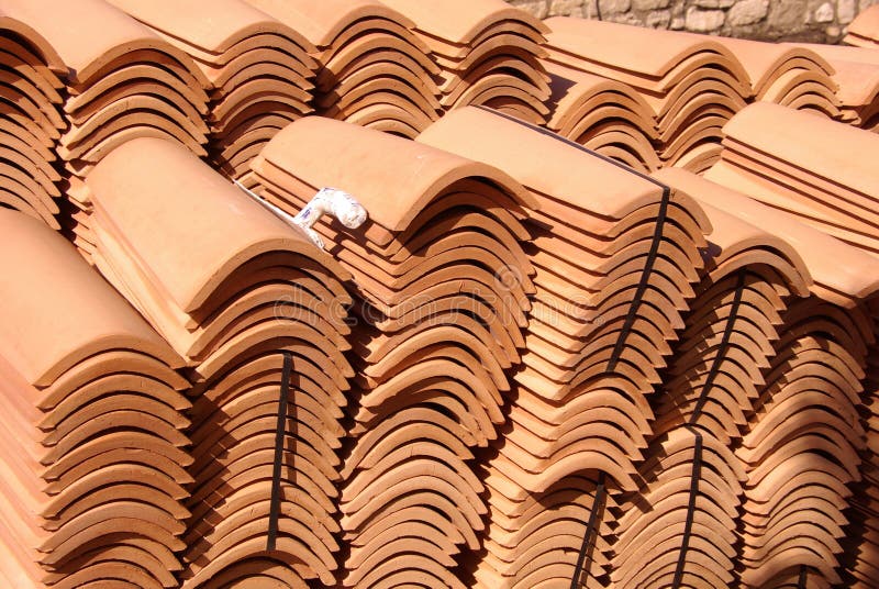 A stack of orange tiles stock photo. Image of bricks - 48932638