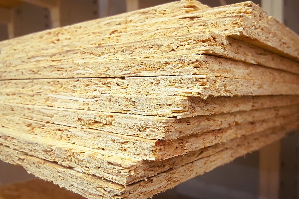 A Stack of OSB Sheets Stacked One on Another. Lumber is Sold at the ...