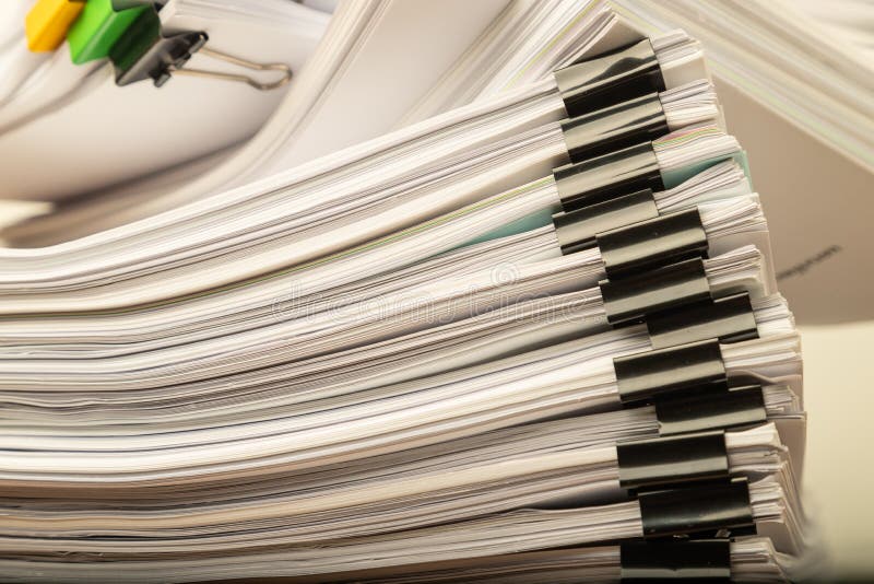 Stack of Overload Document Paper with Black Paperclip Stock Photo ...