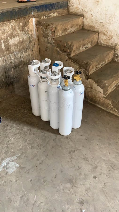 Stack of Oxygen Gas Cylinders for Industrial Use Positioned by Stairs ...
