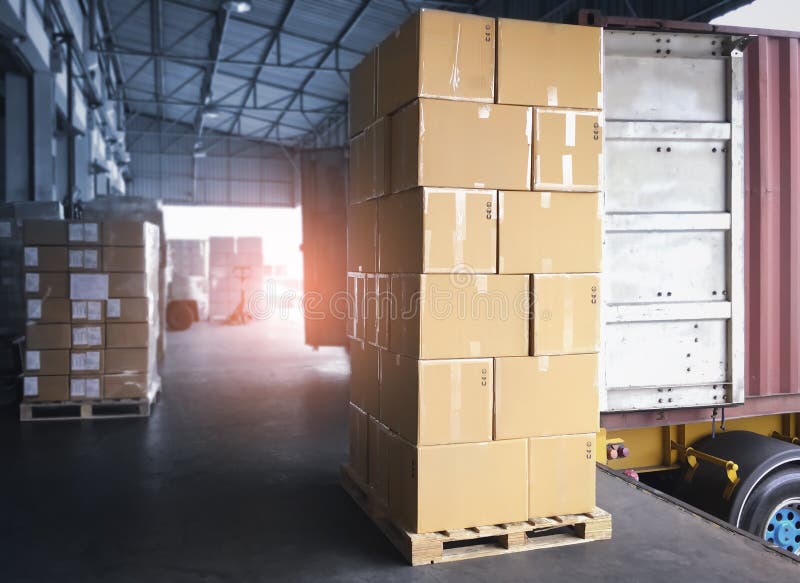 Stack of Package Boxes on Pallets Load with Shipping Cargo Container ...