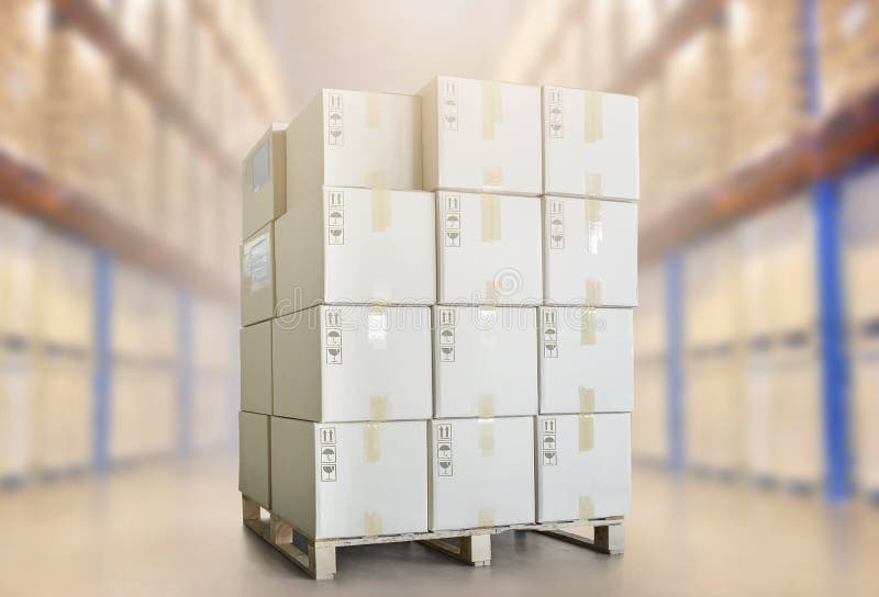 Stack of Package Boxes on Pallet at Storage Warehouse. Packaging ...