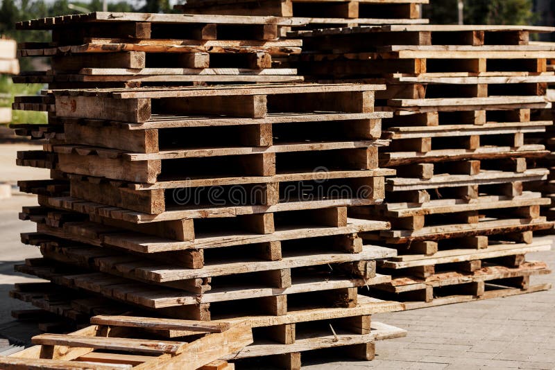 Stack of Pallets Sit Outside Stock Photo - Image of factory, packaging ...