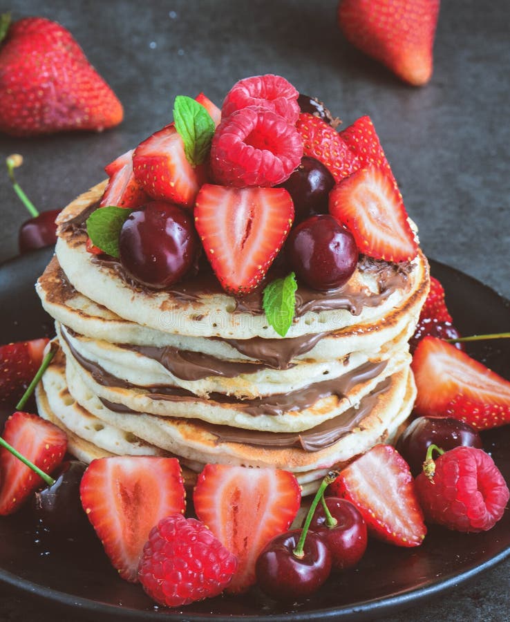 Stack of Pancake with Nutella and Fresh Berries Stock Photo - Image of ...