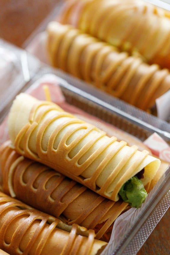 Stack of Pancake Roll Filled with Assorted Filling Stock Photo - Image ...