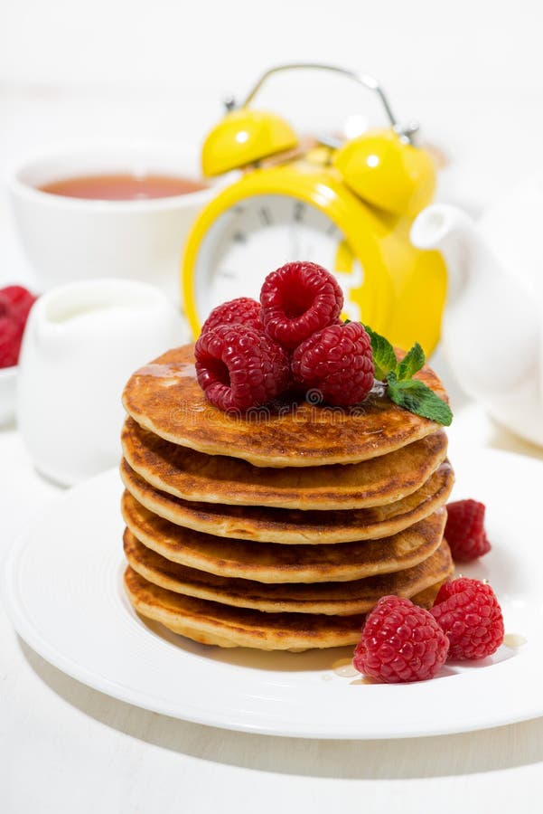Stack of Pancakes with Fresh Raspberries for Breakfast on White Table ...