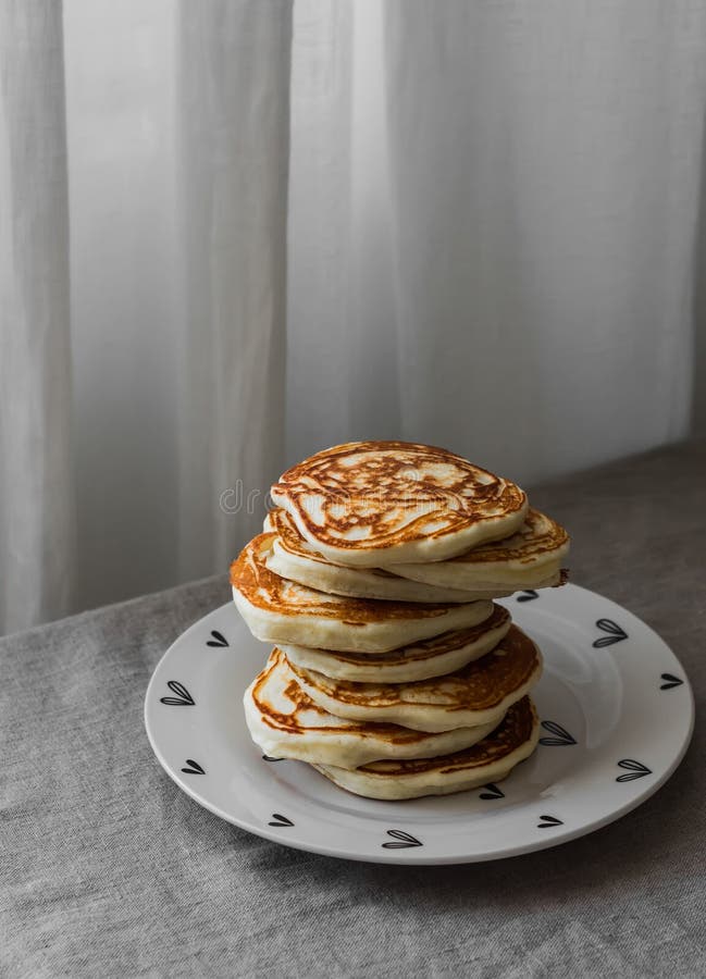 A Stack of Pancakes on a Plate on the Table - a Delicious Breakfast ...