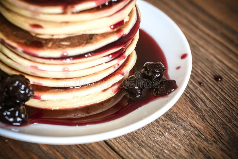 Stack of Pancakes White Plate with Cherry Jam, Red Napkin, Brow Stock ...