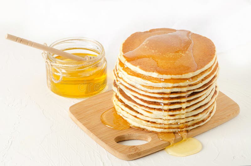 Stack of Pancakes on a Yellow Plate with Honey Stock Photo - Image of ...