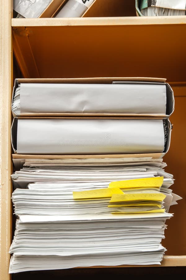 Office Bookcase with Plants and Folders Over Wall Stock Image - Image ...