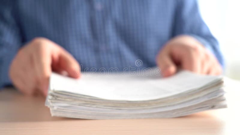 A Stack of Paper Files Falls on the Table. Office Work Concept Stock ...