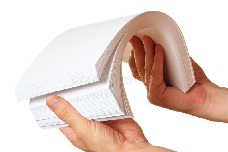 Stack of paper in his hand stock photo. Image of ream - 16397862