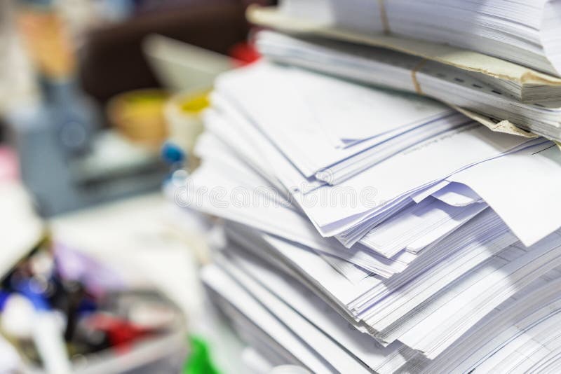 The Stack of Paper Lay on a Messy Office Table.; Stock Image - Image of ...