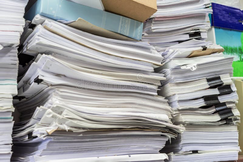 The Stack of Paper Lay on a Messy Office Table.; Stock Image - Image of ...