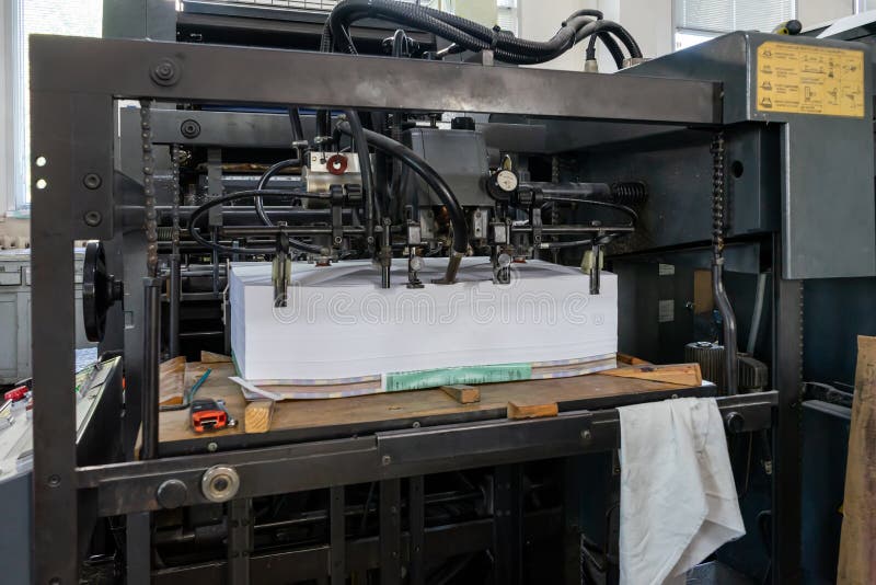 A Stack of Paper is Loaded into a Typewriter Stock Image - Image of ...