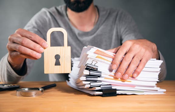 Stack of paper and lock stock image. Image of padlock - 366855443