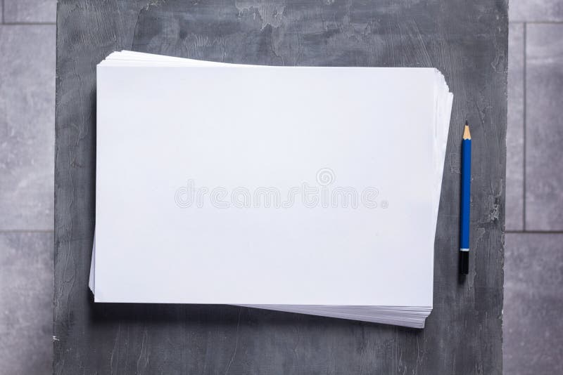 Stack of Paper Sheet with Empty Pages on Table Background. Creative ...