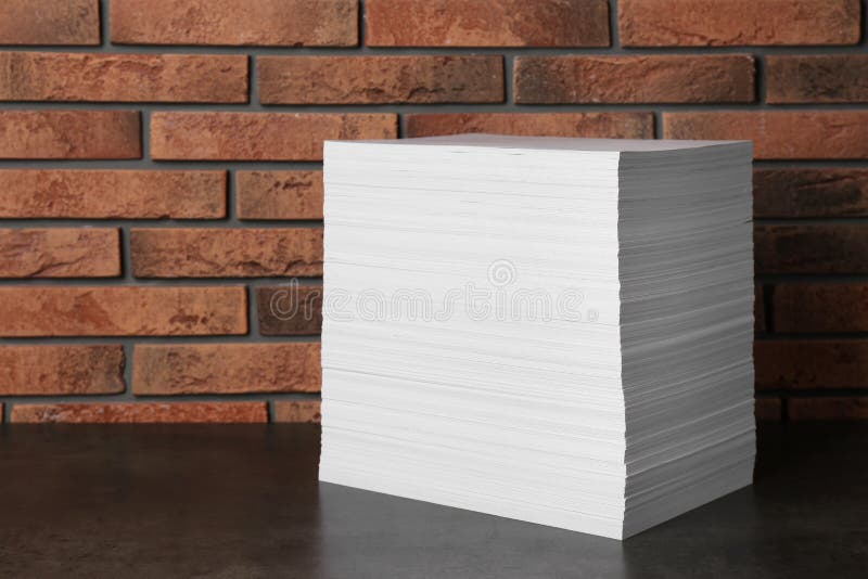 Stack of Paper Sheets on Black Table Stock Photo - Image of organize ...