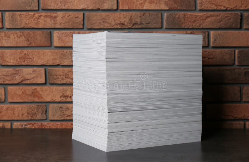 Stack of Paper Sheets on Grey Table. Space for Text Stock Image - Image ...