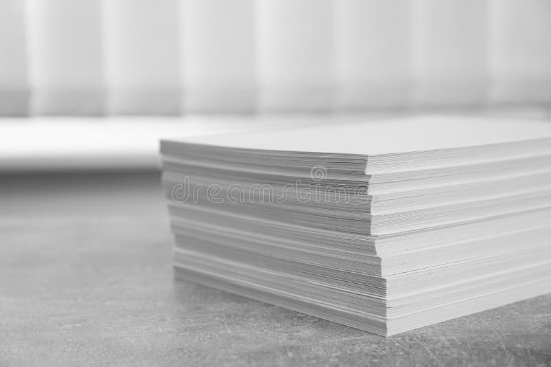Stack of Paper Sheets on Grey Table, Closeup Stock Photo - Image of ...