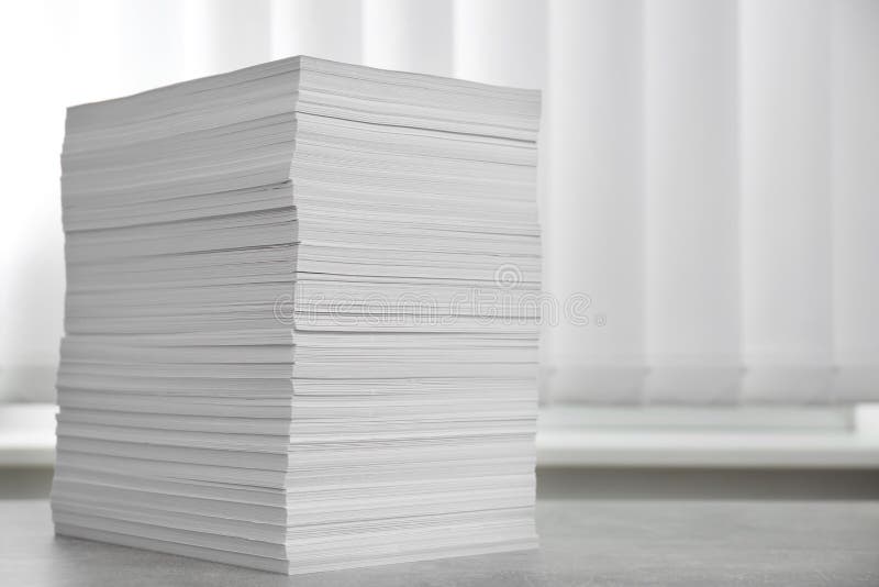 Stack of Paper Sheets on Grey Table. Space for Text Stock Image - Image ...