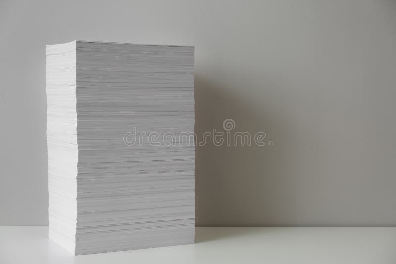Stack of Paper Sheets on White Table. Space for Text Stock Image ...