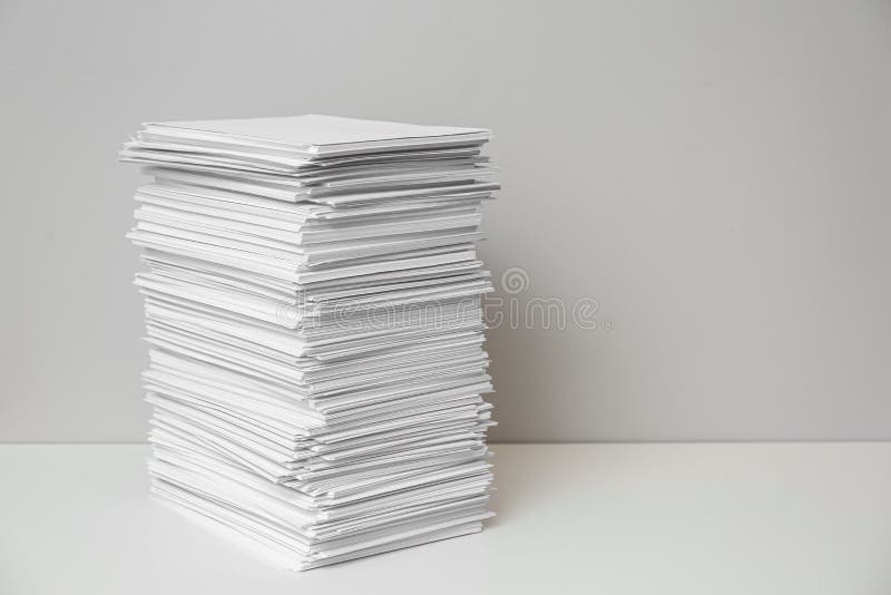 Stack of Paper Sheets on White Table. Space for Text Stock Image ...