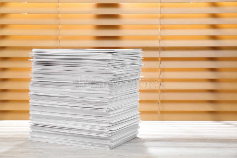 Stack of Paper Sheets on White Wooden Table. Space for Text Stock Photo ...