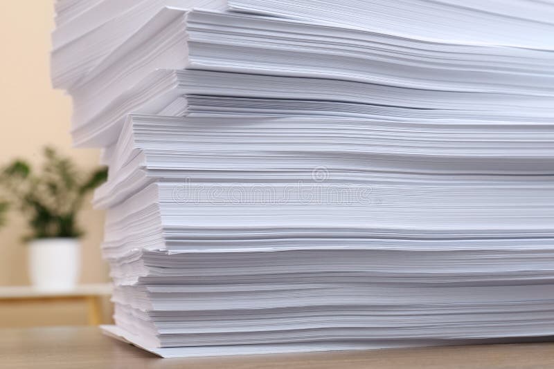 Stack of Paper Sheets on Wooden Table Indoors, Closeup Stock Photo ...