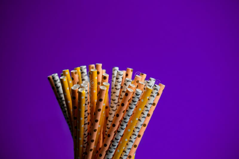 Stack of Paper Straws Isolated on Purple Background Stock Image - Image ...