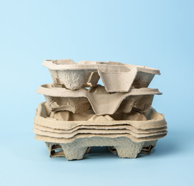 Stack of Paper Takeaway Beverage Holders on Blue Background Stock Image ...