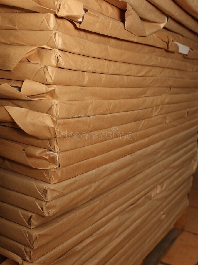 Stack of Paper-wrapped Shipments in Storage Stock Image - Image of ...