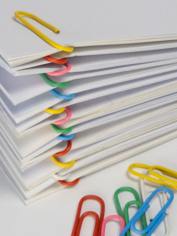 Stack of Papers Secured with Colorful Paper Clips for Organization ...