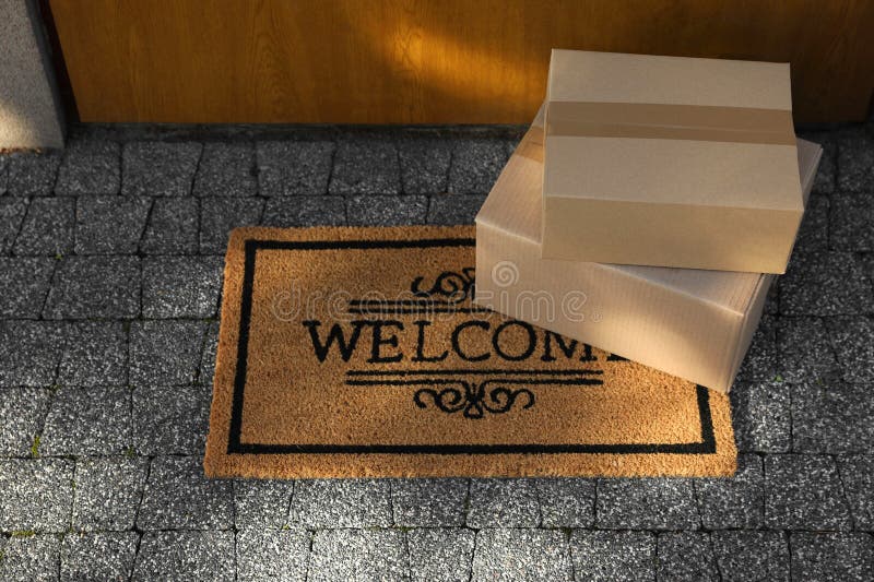 Stack of Parcels Delivered Near Front Door Stock Photo - Image of ...