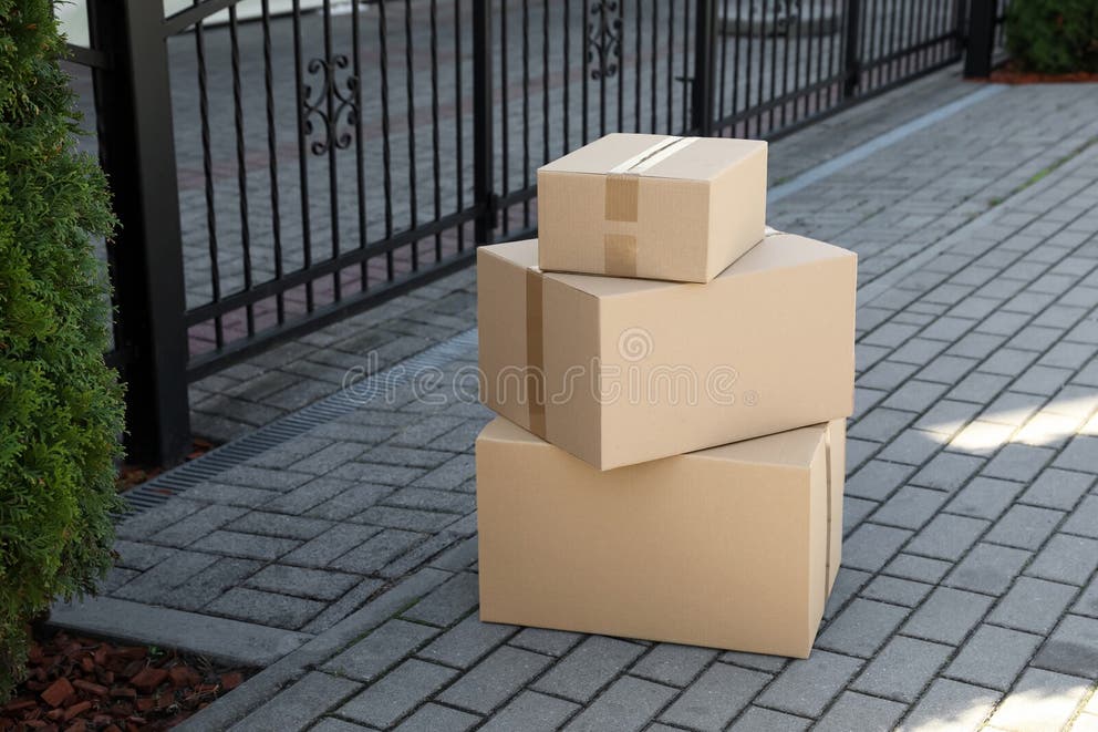 Stack of Parcels Delivered Near Front Gates Stock Image - Image of ...