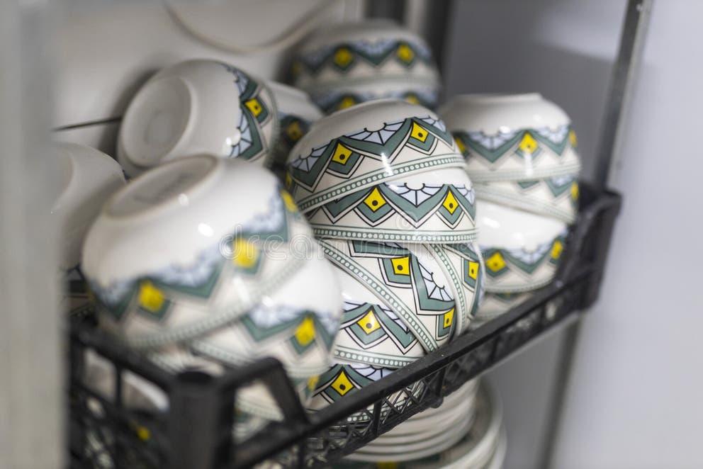 Stack of Patterned Bowls on a Dish Rack Stock Image - Image of stall ...