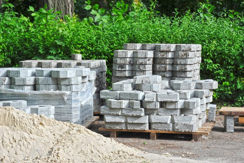 A Stack of Paving Slabs and Wooden Pallets from it Stock Image - Image ...