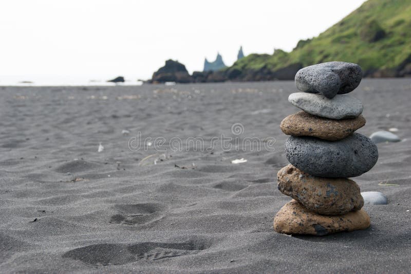 Stack of Pebble Stones at the Black Sand Beach in the South of Iceland ...