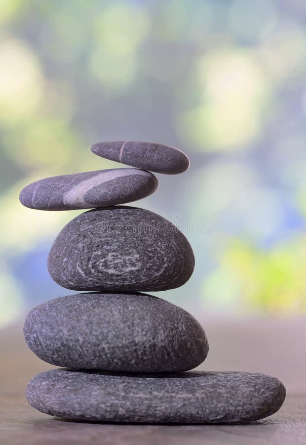 Stack of Pebble Stones Unbalanced on a Sandy Beach Stock Image - Image ...